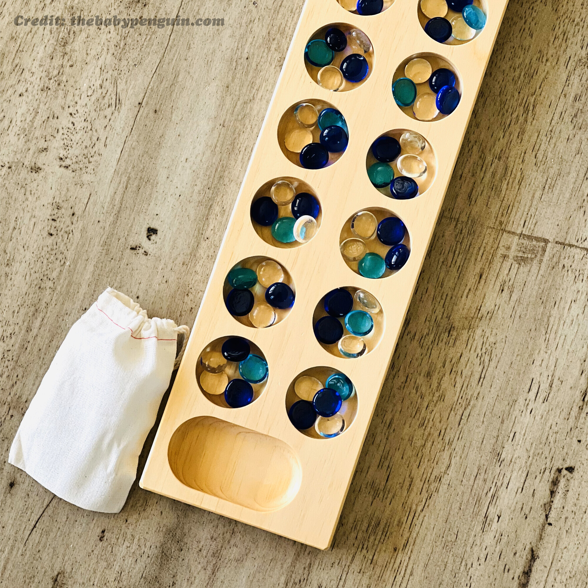 Mancala — Maple Landmark